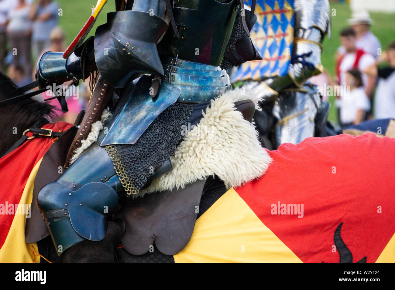 Armored knight sitting hi-res stock photography and images - Alamy