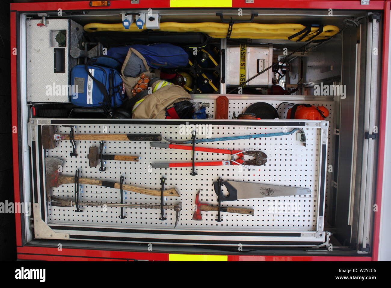 Modern firefighter truck with an emergency tool and equipment for using ...