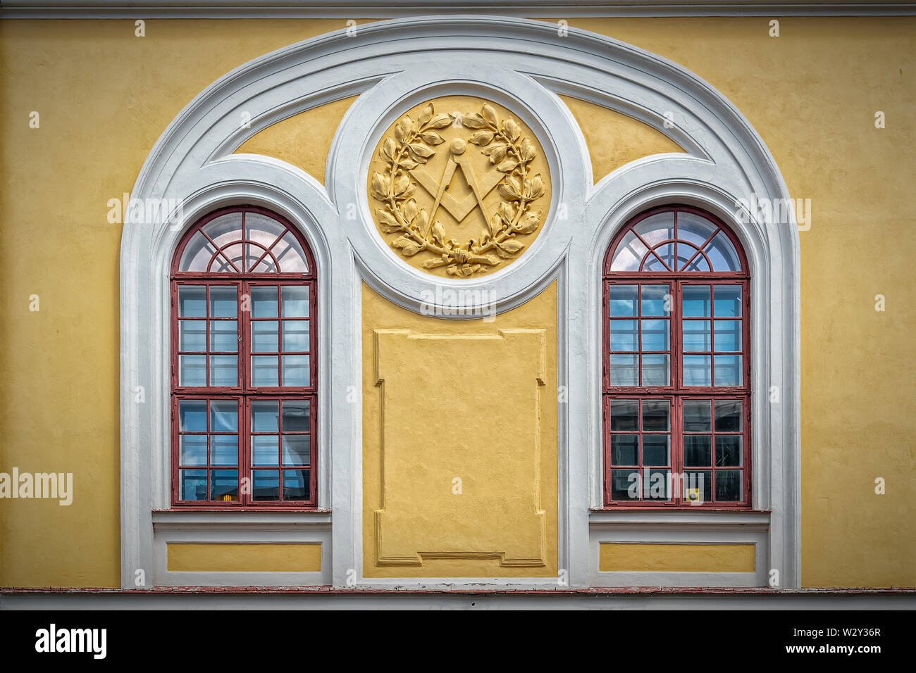 A decorative art deco style window on a building in the swedish town of ...