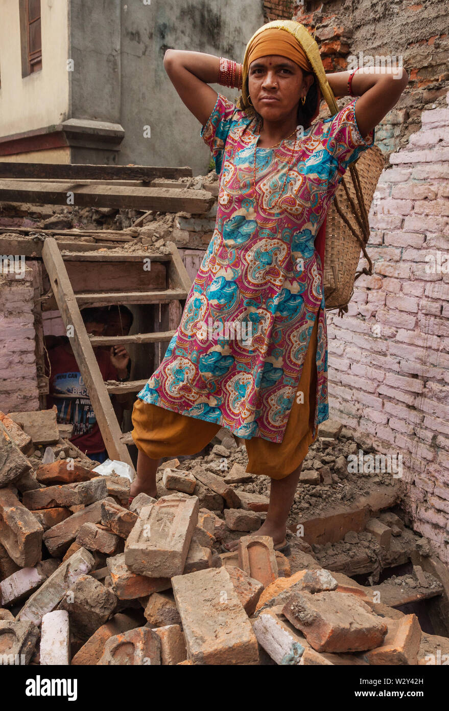 Women carrying bricks hi-res stock photography and images - Alamy