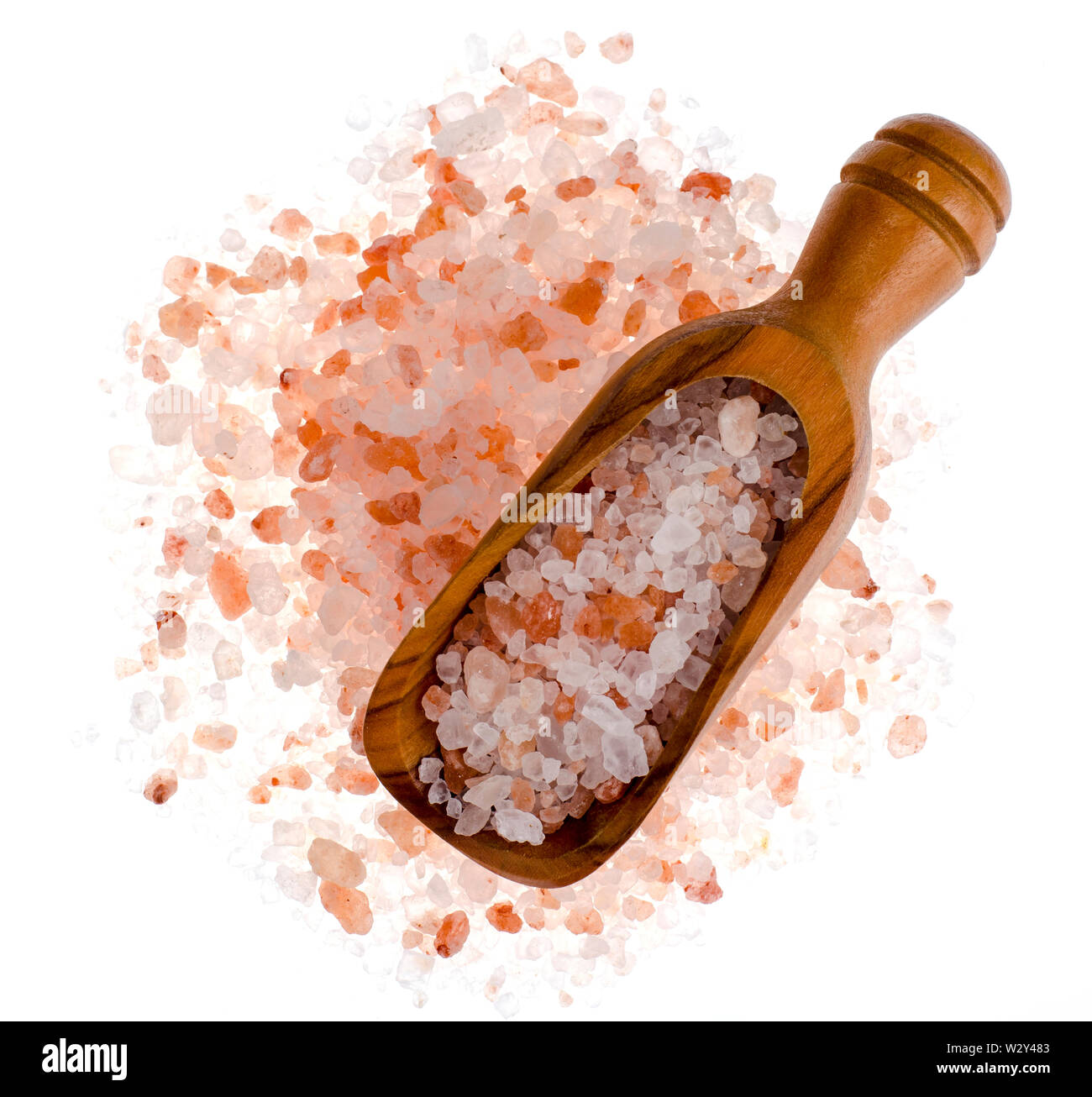 Sea salt in wooden scoop isolated on white background Stock Photo - Alamy