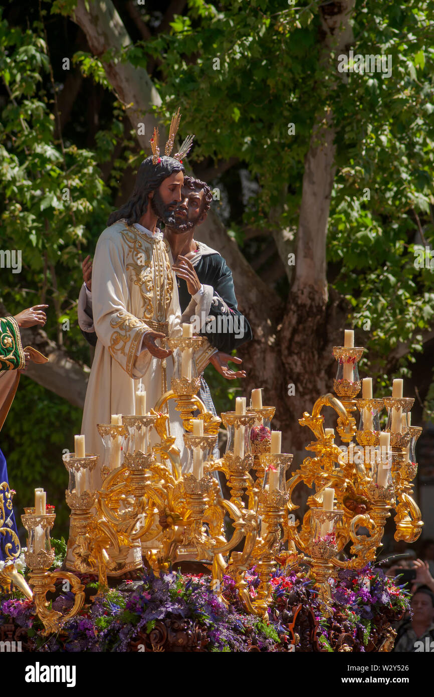 Brotherhood of the kiss of Judas, Holy Week in Seville Stock Photo - Alamy