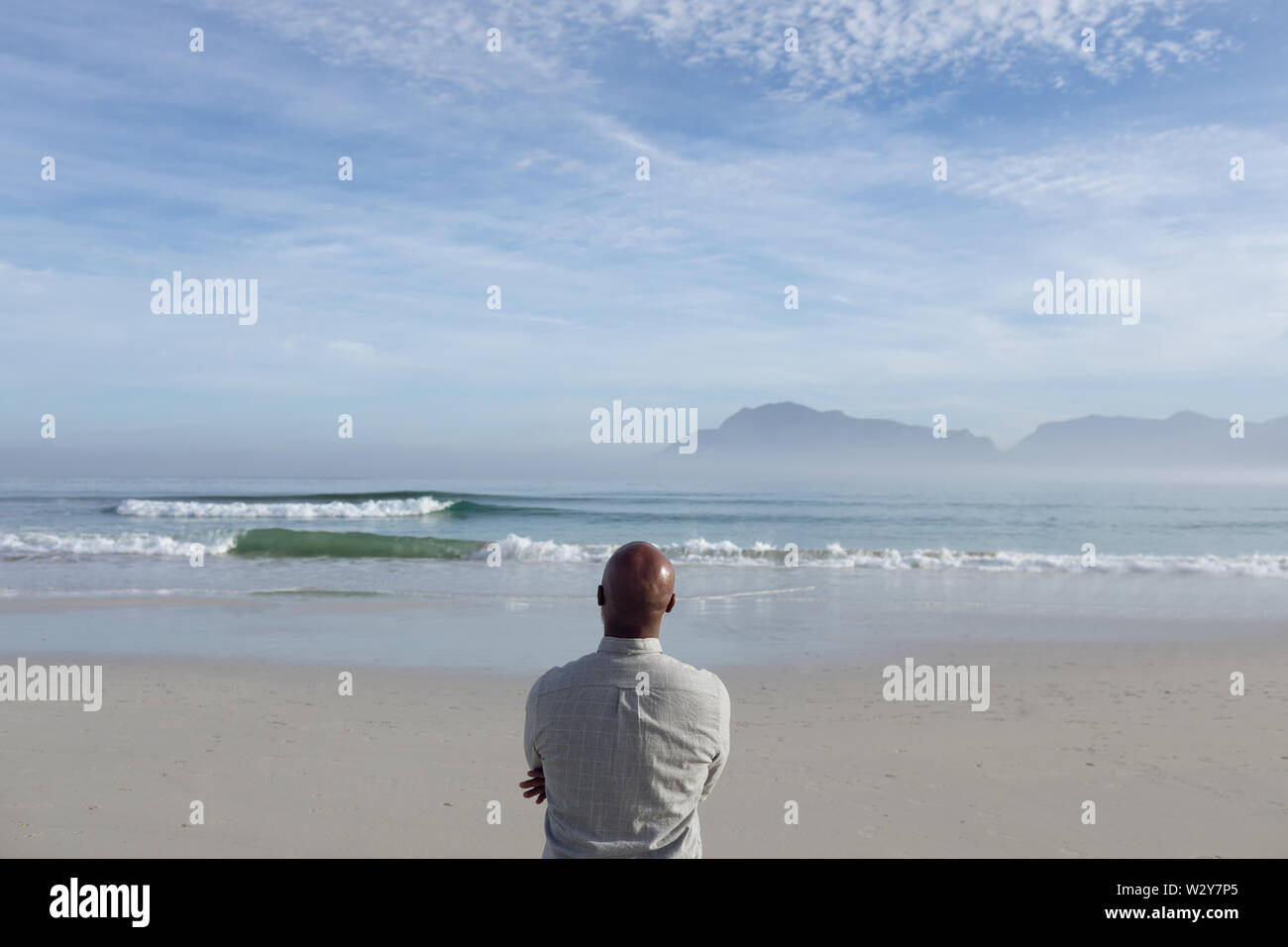 Man gazing at the beach Stock Photo - Alamy