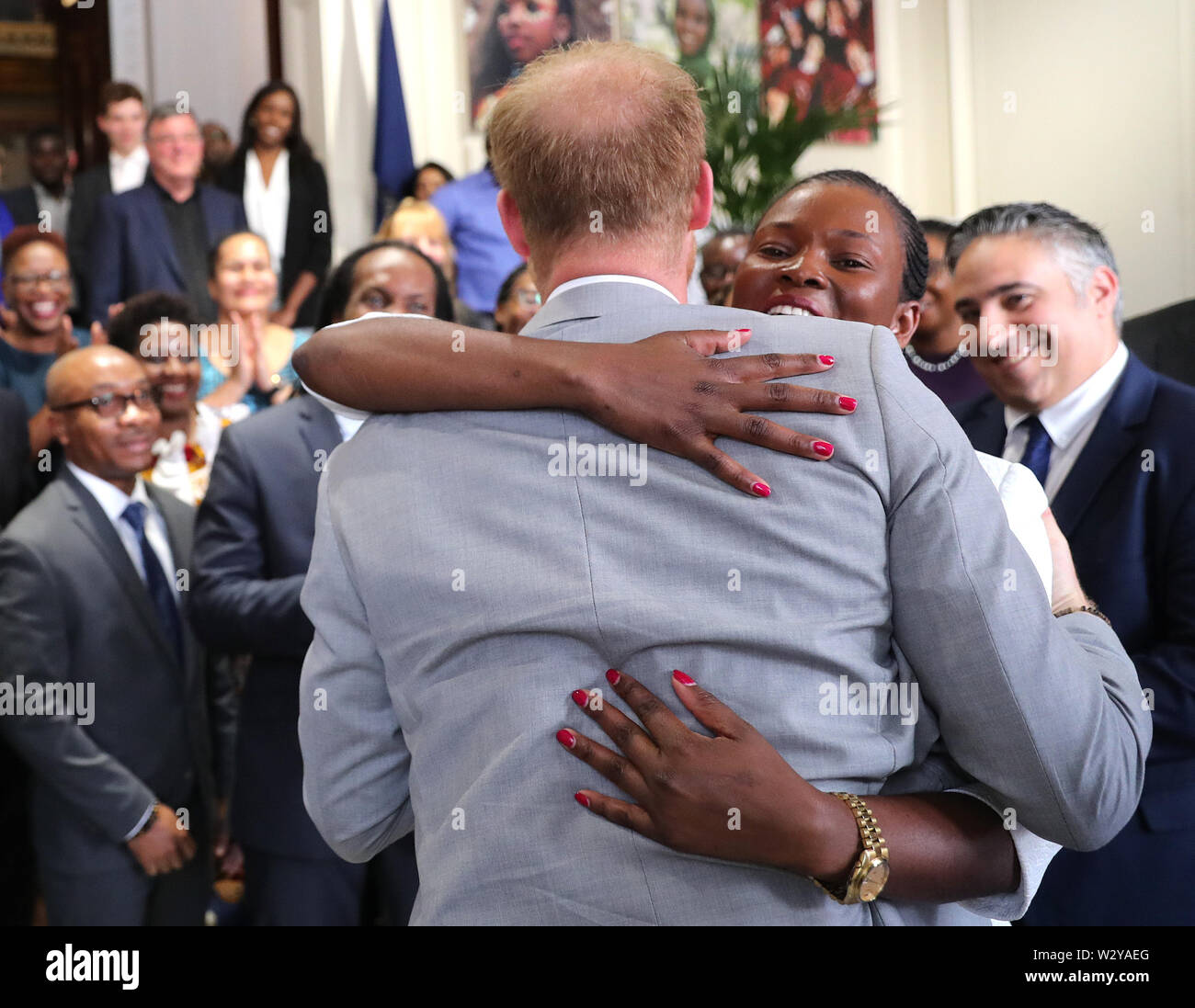 The duke of sussex receive a hug from irene kendi hi-res stock ...