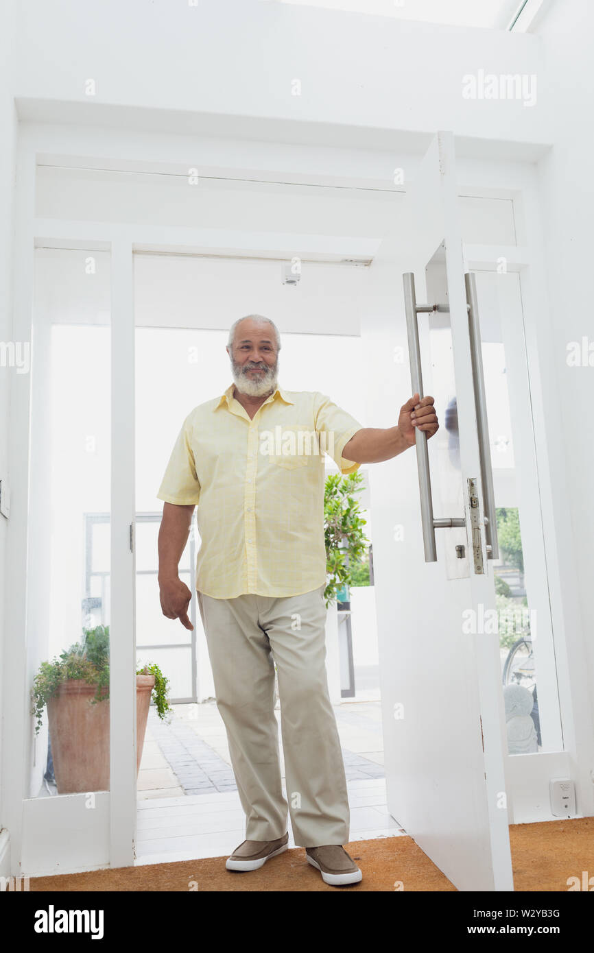 Holding door hi-res stock photography and images - Alamy