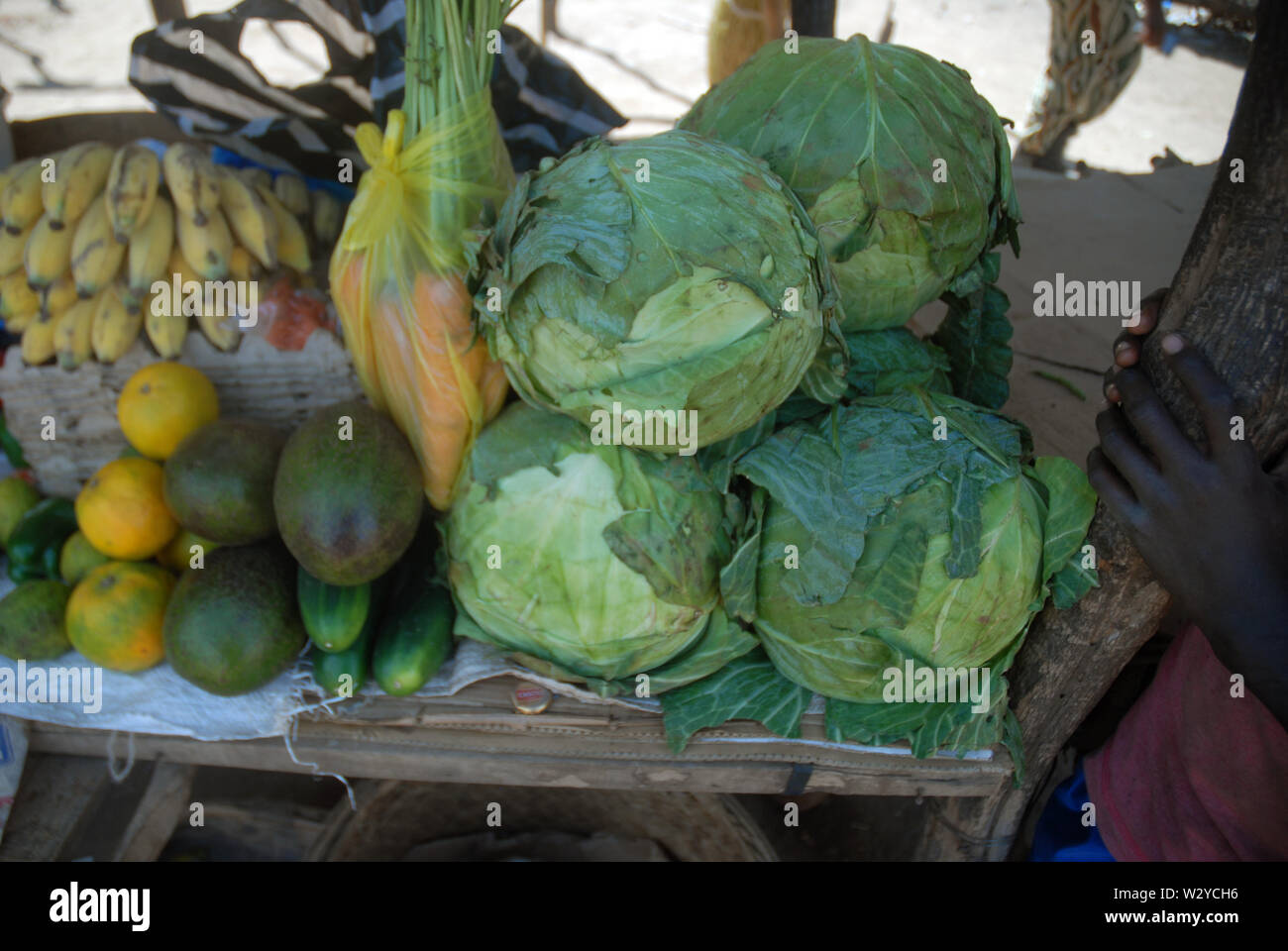Lady selling vegetables at a market in Mfuwe, South Luangwa National ...
