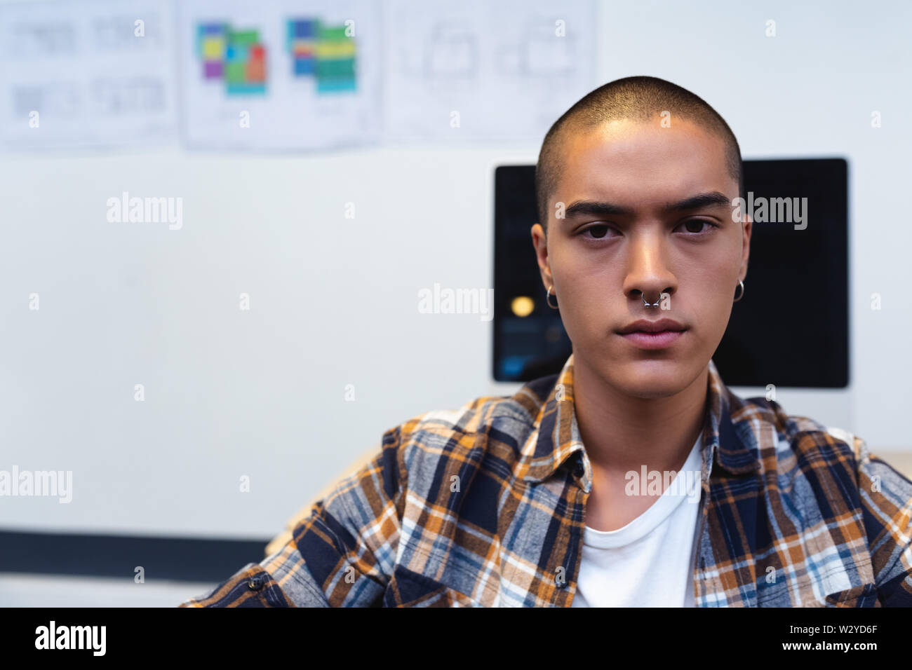 Disabled male executive smiling at desk in office Stock Photo - Alamy