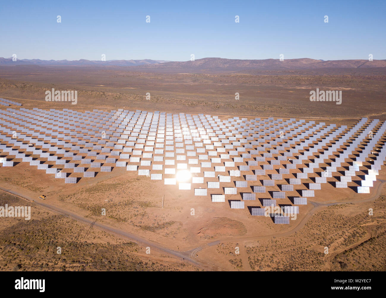 Aerial over solar panels in a dry landscape Stock Photo - Alamy