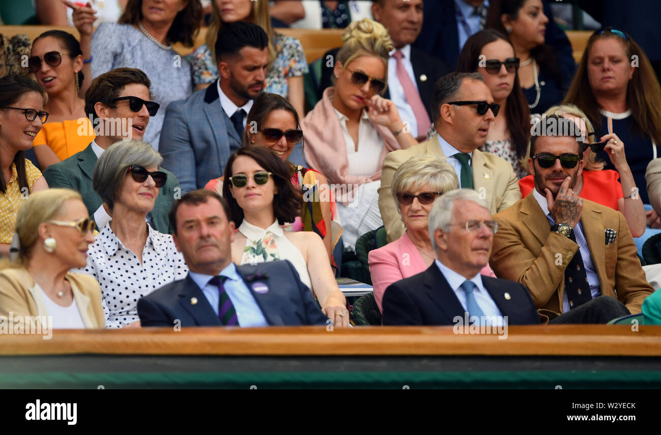 Claire Foy, (centre, left) sits alongside Sandra and David Beckham in ...
