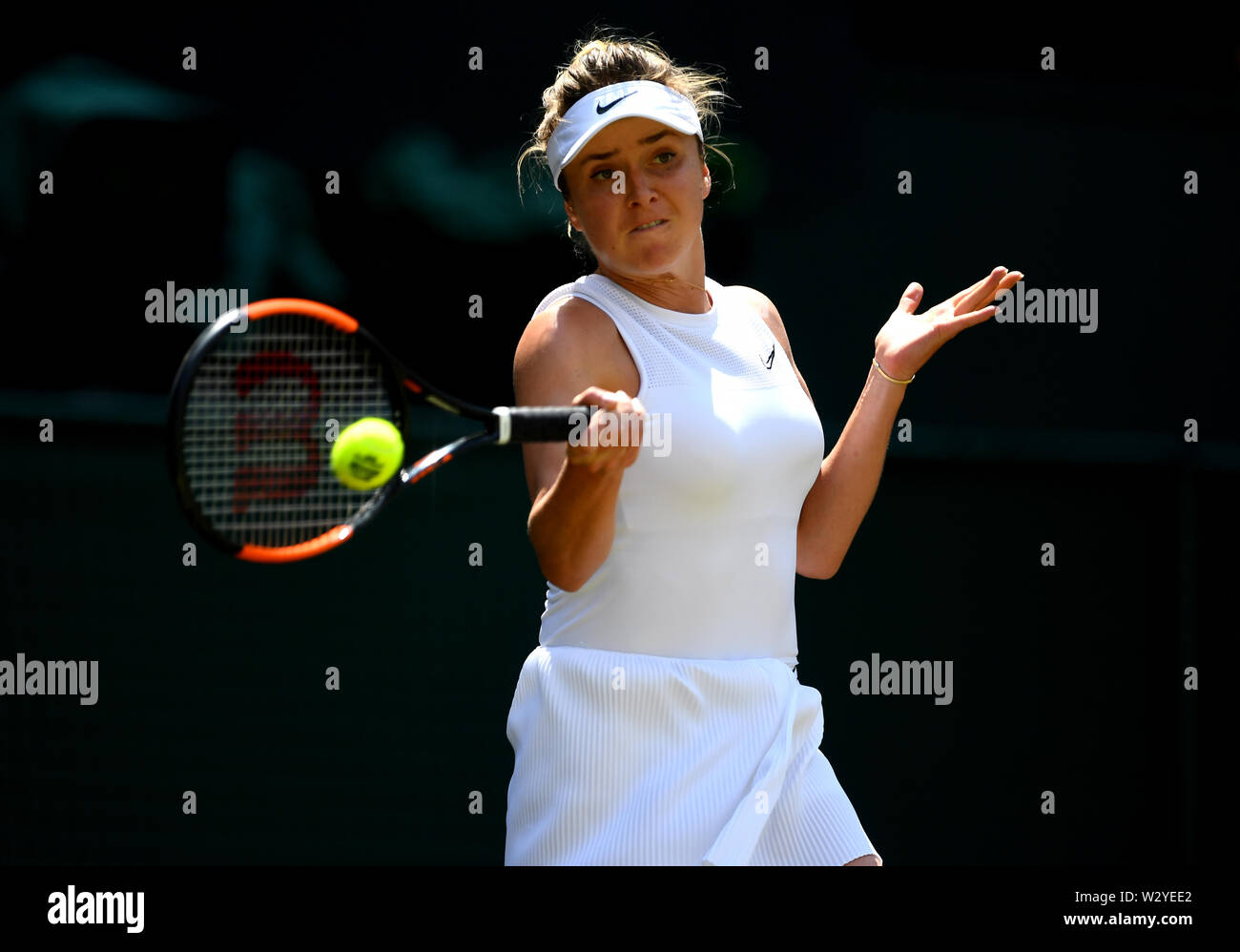 Elina Svitolina in action against Simona Halep on day ten of the ...