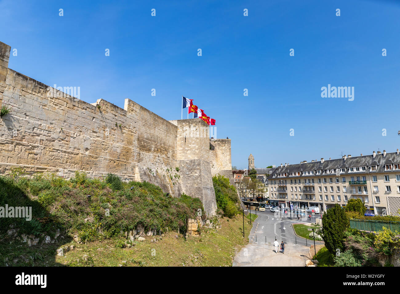 Caen medieval castle walls and flags in Normandy, France Stock Photo ...