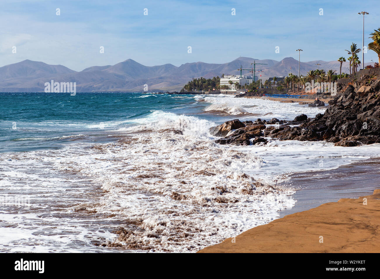 Wavy sea in Puerto del Carmen beach in Lanzarote, Canary islands, Spain ...