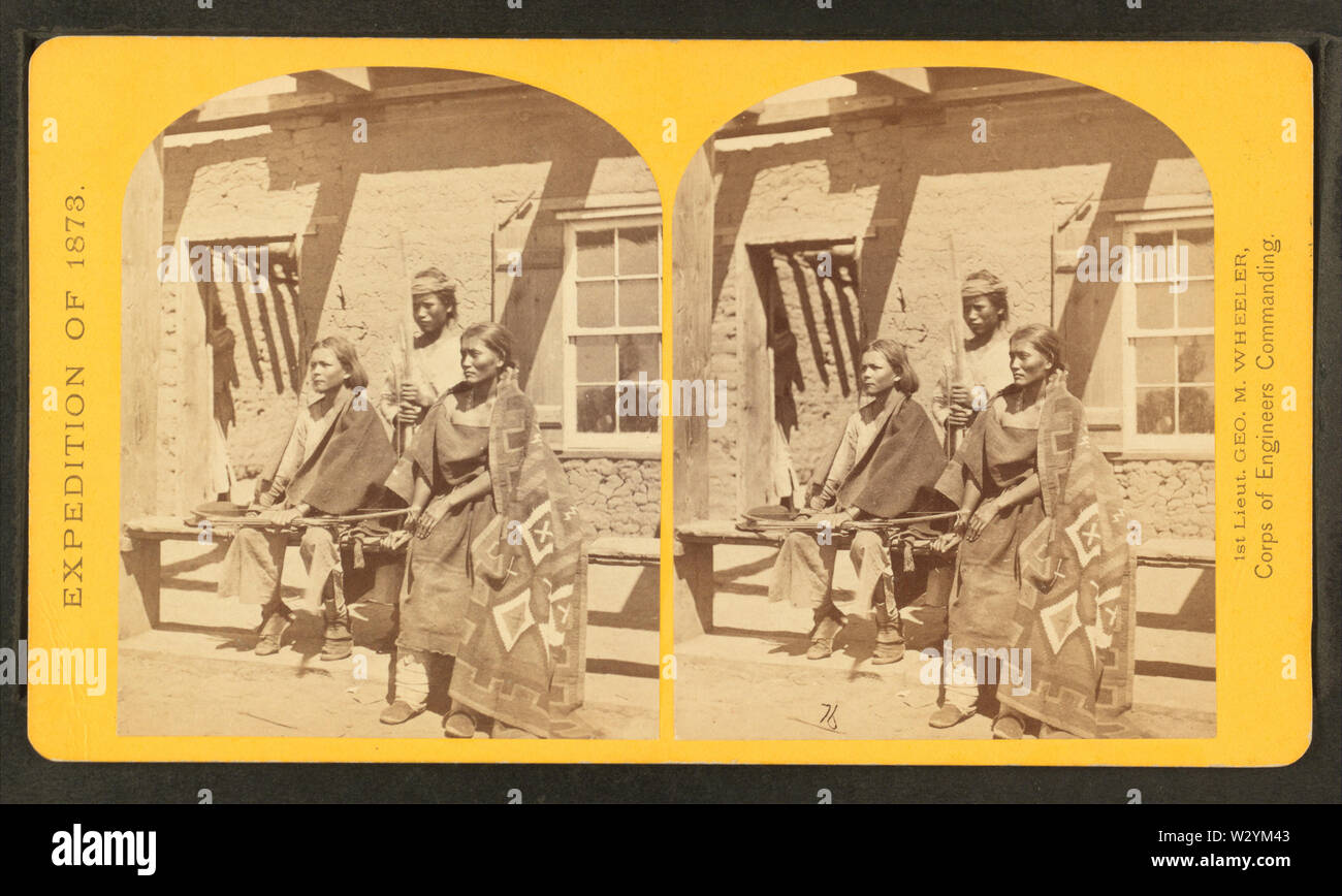 Navajo boys and squaw, in front of the quarters at old Fort Defiance ...