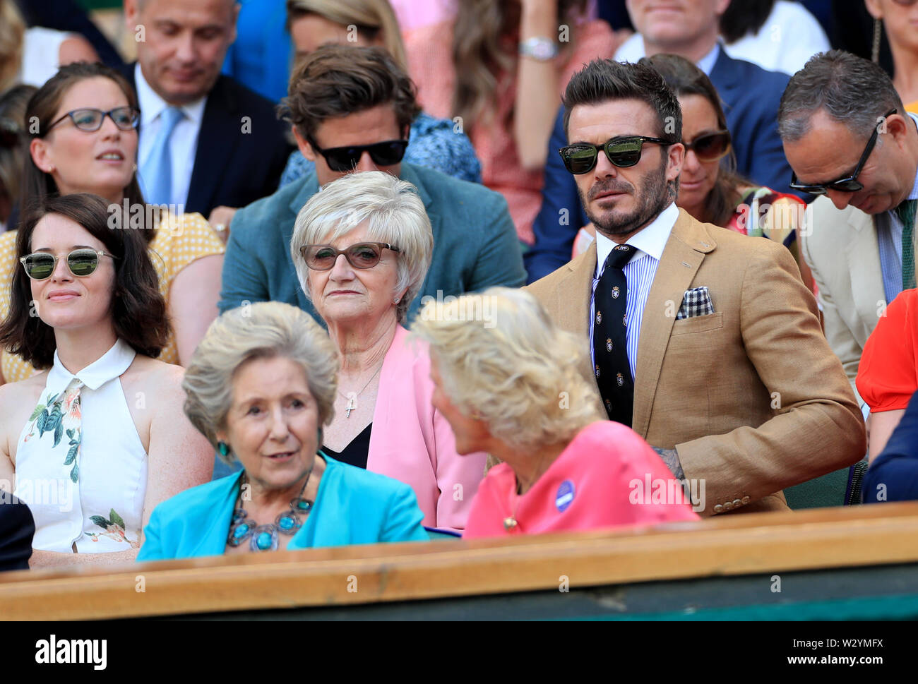 David Beckham in the royal box with Sandra Beckham and Claire Foy (left ...