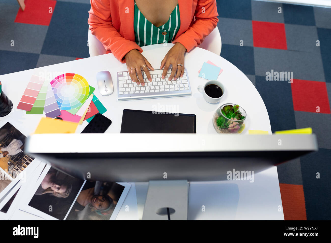 Female designer working on computer hi-res stock photography and images ...