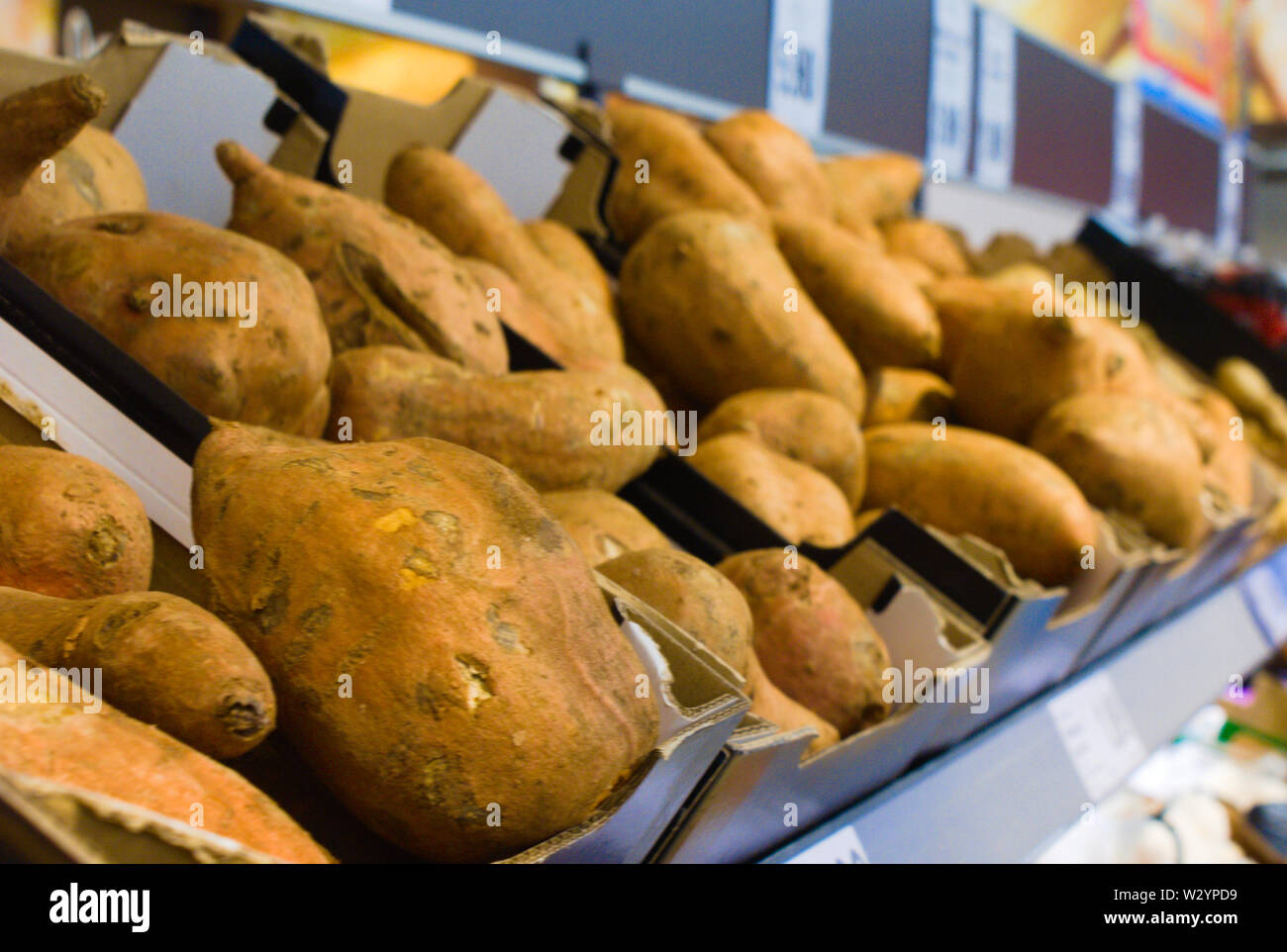 sweet potato in the supermarket Stock Photo - Alamy