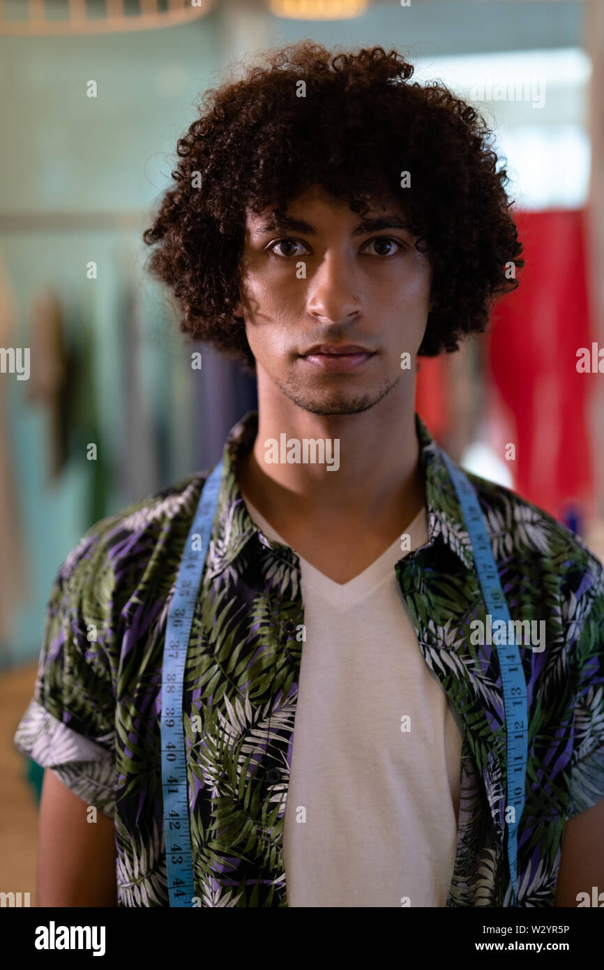 Male fashion designer standing in design studio Stock Photo - Alamy