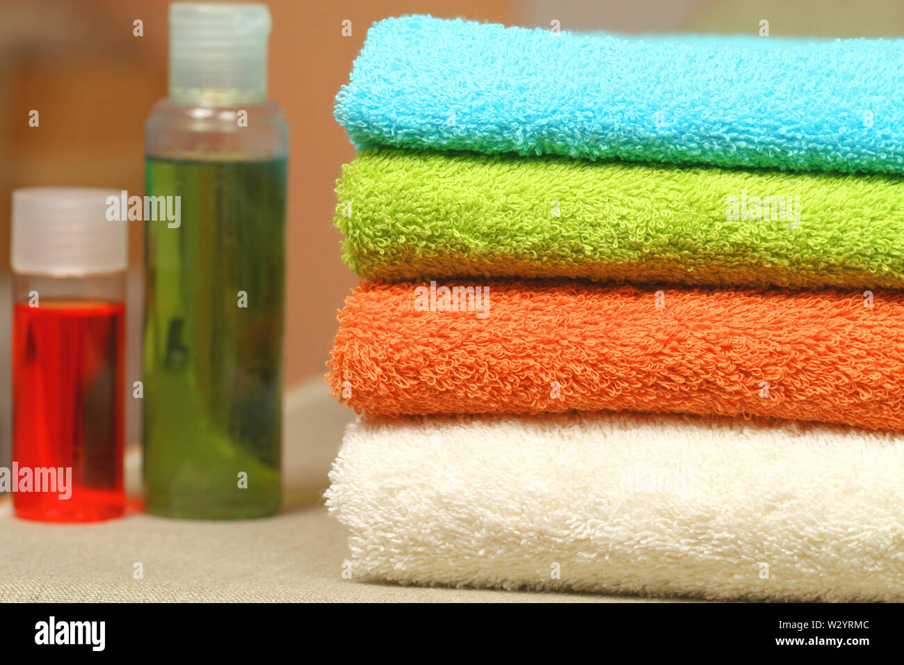 Bath and spa tools - bath gels and colorful towels Stock Photo - Alamy