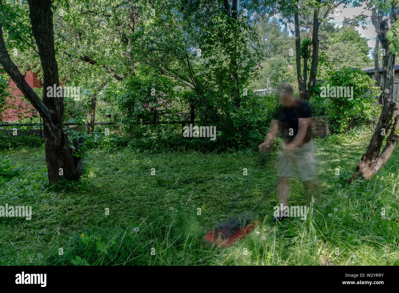 Garden overgrown mower hi-res stock photography and images - Alamy