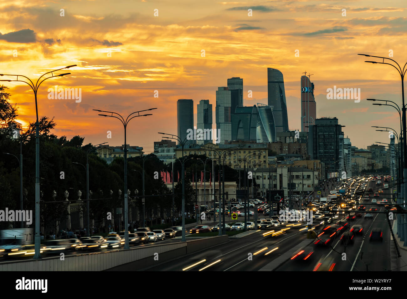view of the skyscrapers and towers of downtown at sunset Stock Photo ...