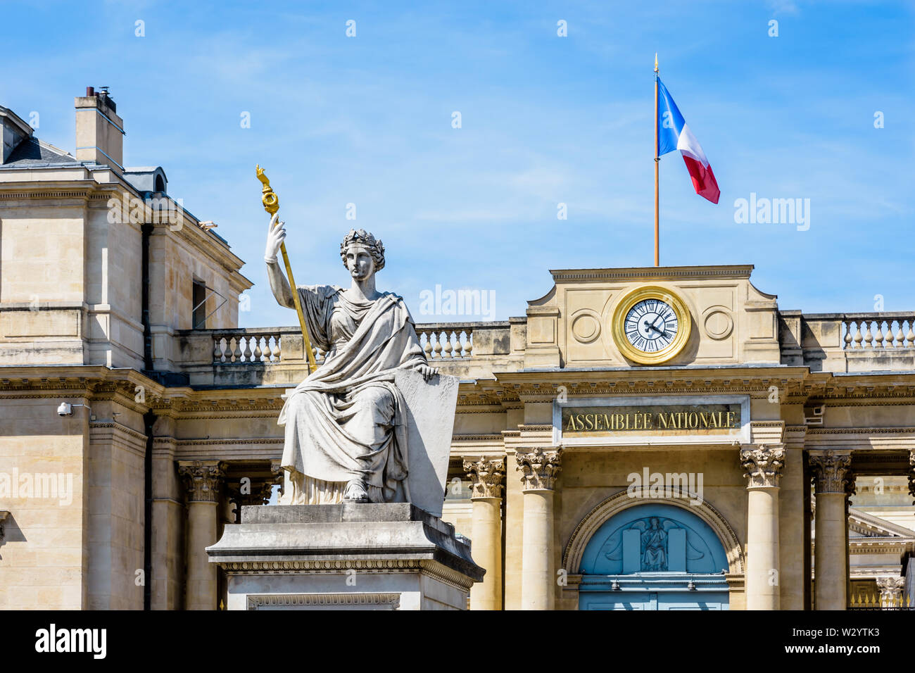Close-up view of the statue named The Law with the southern entrance of ...