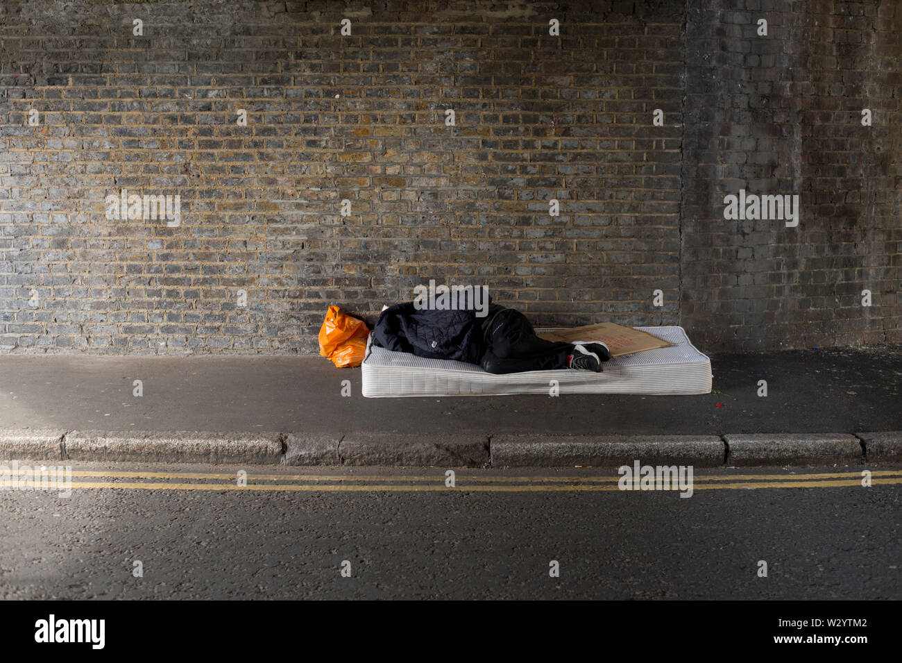Hackney. Homeless man , newly arrived from Poland, sleeping on the ...