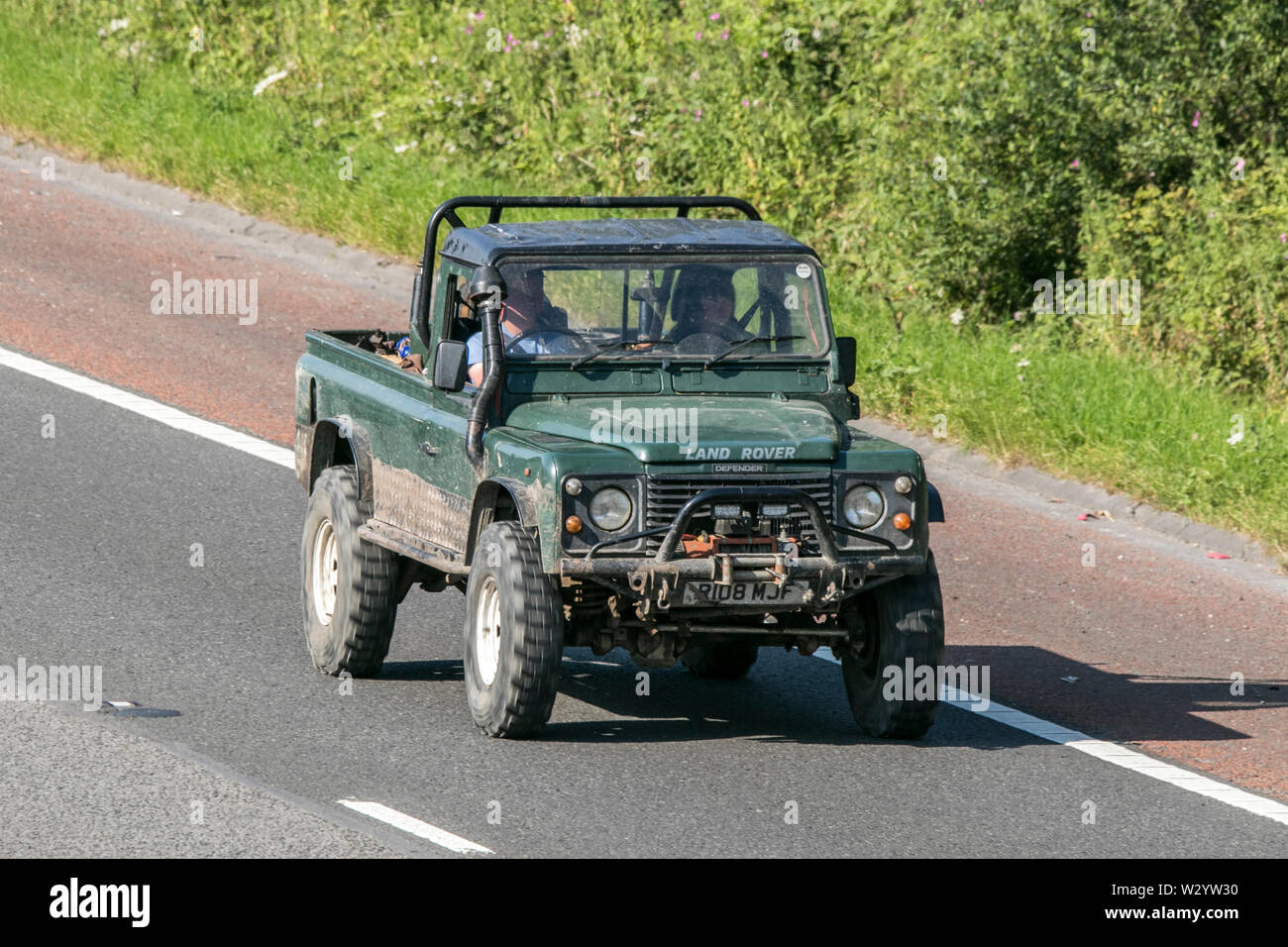 Land rover defender 110 classic cars hi-res stock photography and ...