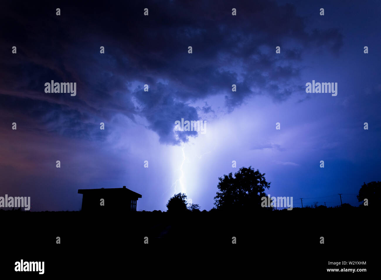 Lightning striking during heavy hi-res stock photography and images - Alamy