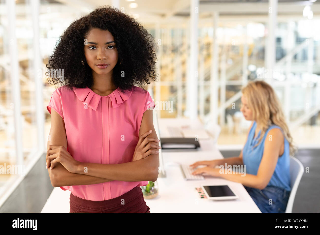 Female executive sitting hi-res stock photography and images - Alamy