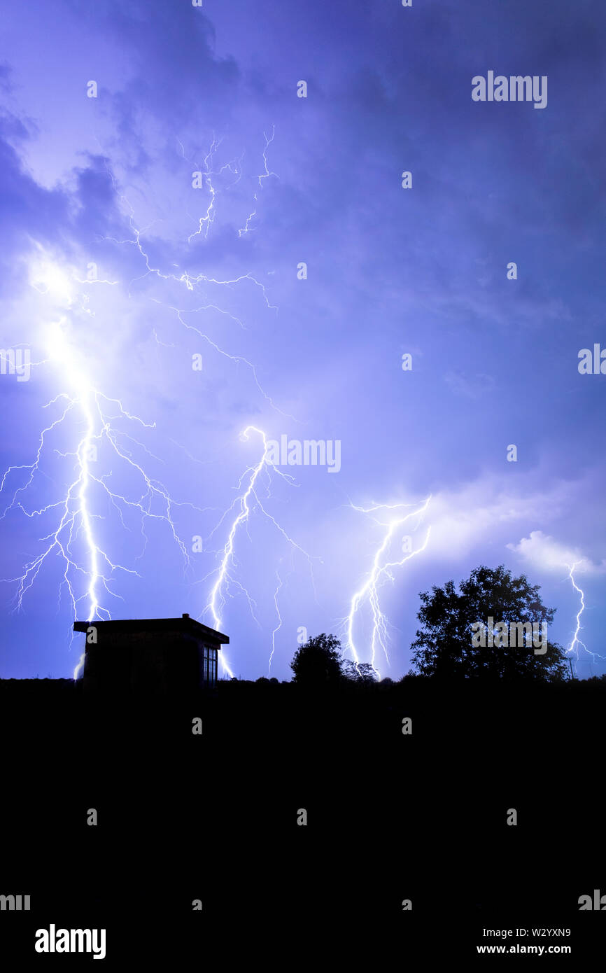 Lightning striking during heavy hi-res stock photography and images - Alamy