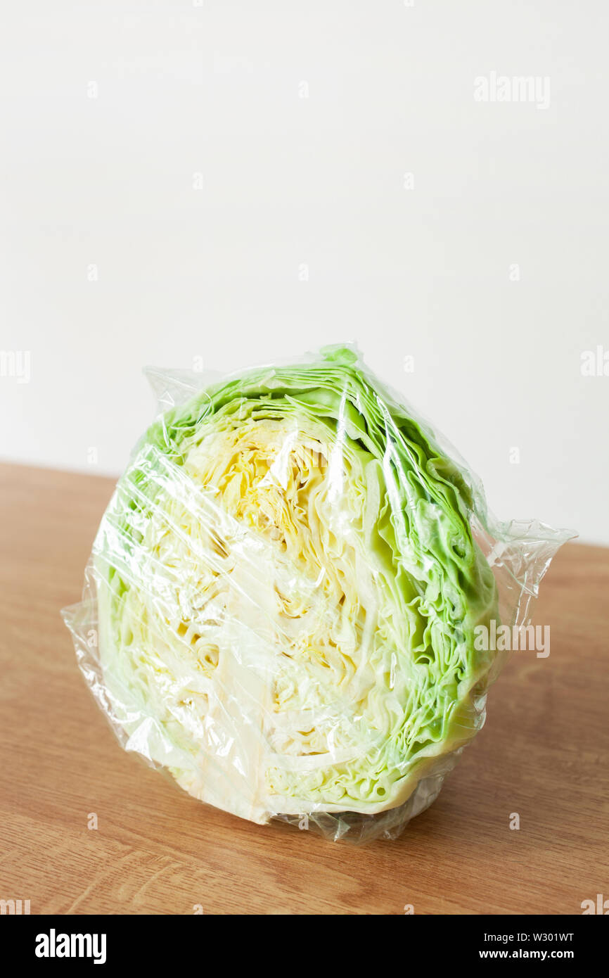 cabbage vegetable in plastic bag. single use plastic packaging issue ...