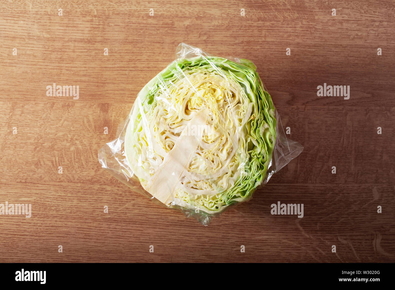 cabbage vegetable in plastic bag. single use plastic packaging issue ...