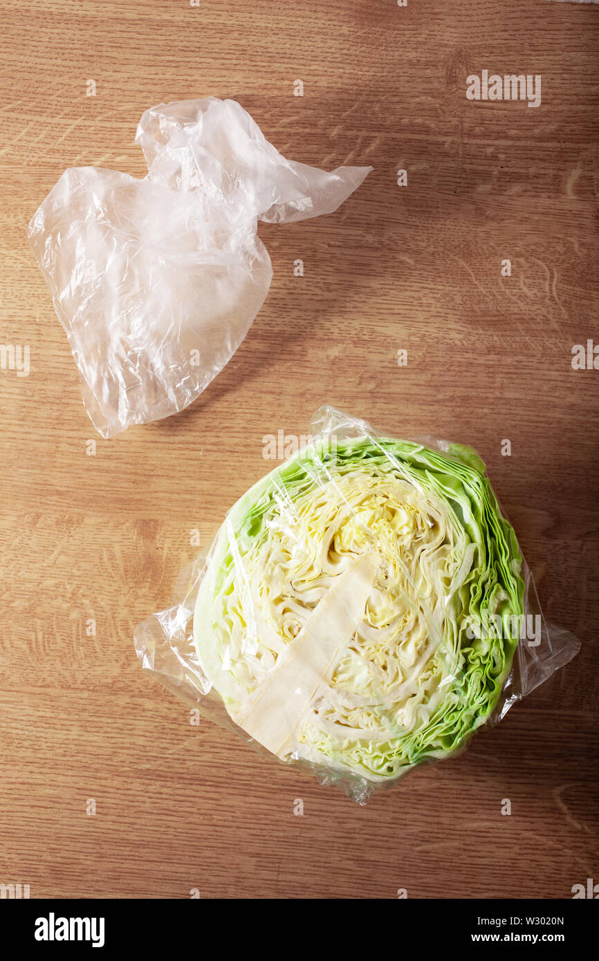 cabbage vegetable in plastic bag. single use plastic packaging issue ...