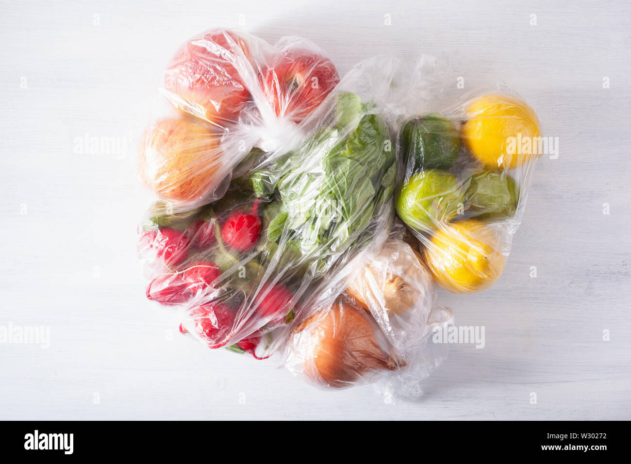 single use plastic packaging issue. fruits and vegetables in plastic ...