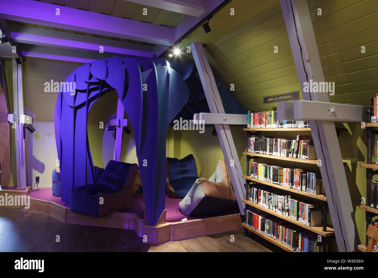 Seating area and bookshelves in children's library. Deichman Library ...