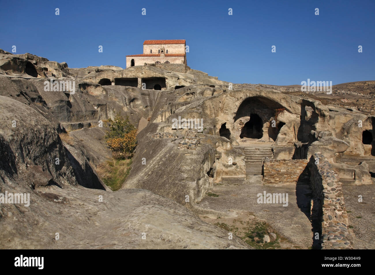 Ancient basilica at Uplistsikhe cave complex (Lord's fortress) near ...