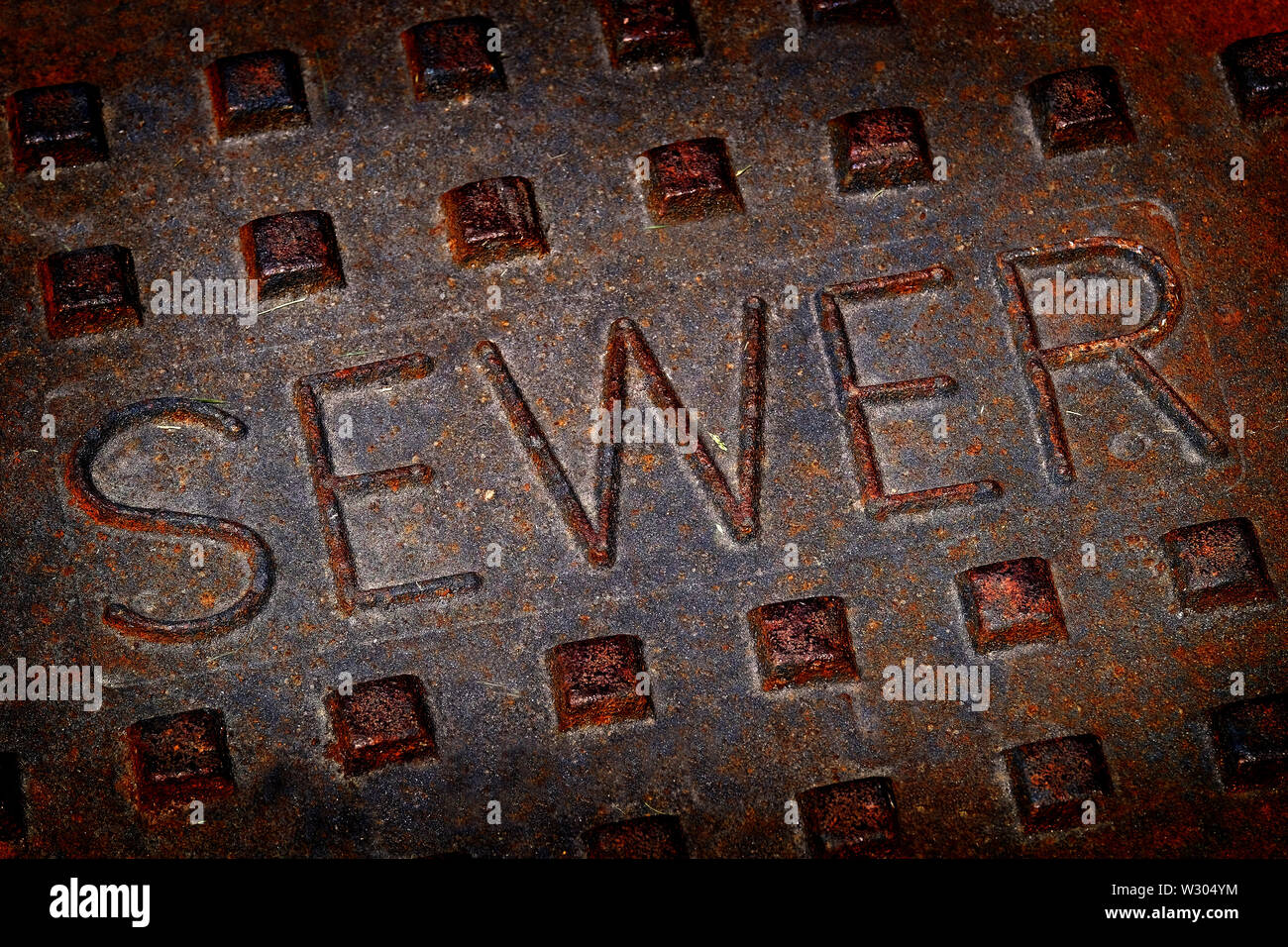 Sewer cover metal grate iron plate steel Stock Photo - Alamy
