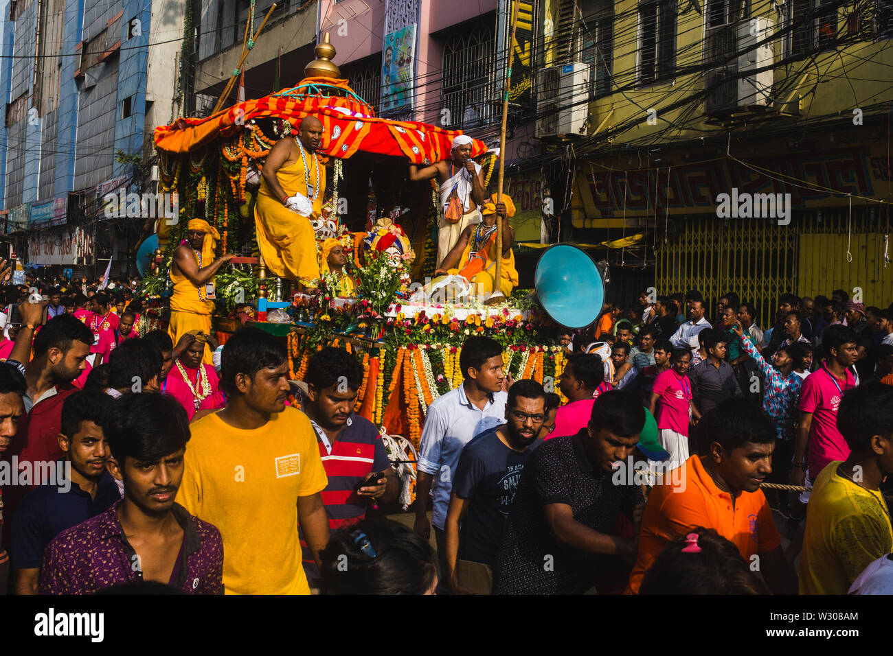 People took part in public procession with a chariot Stock Photo - Alamy