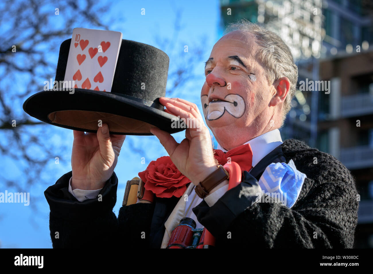 Clown Professor Crump performs a card trick at the annual Grimaldi ...