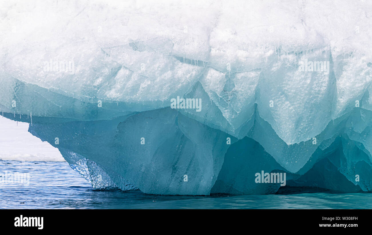 Glacial blue ice background with space for your text. Underside of a ...