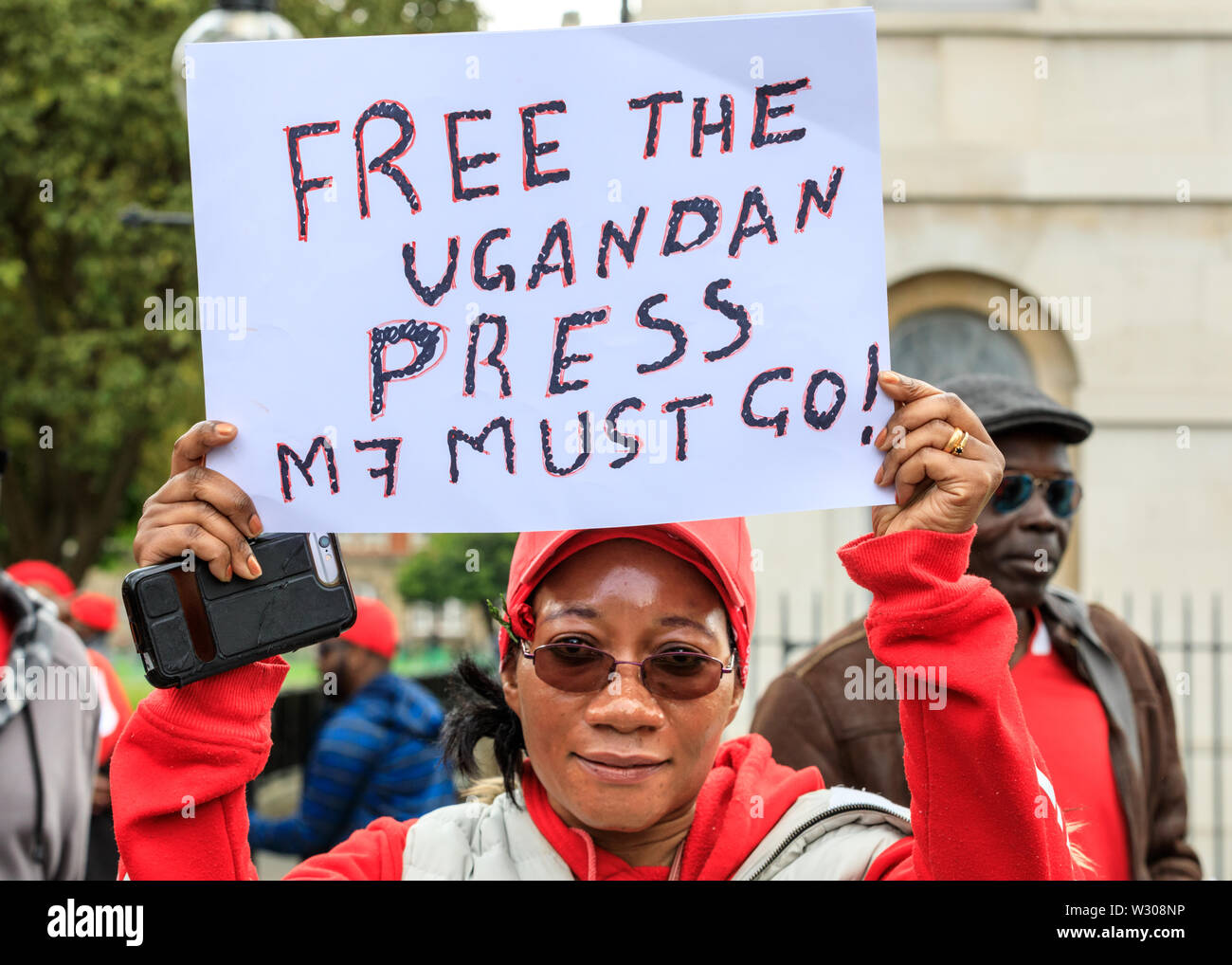 A Ugandan protester with 'free the press' sign demonstrating against ...