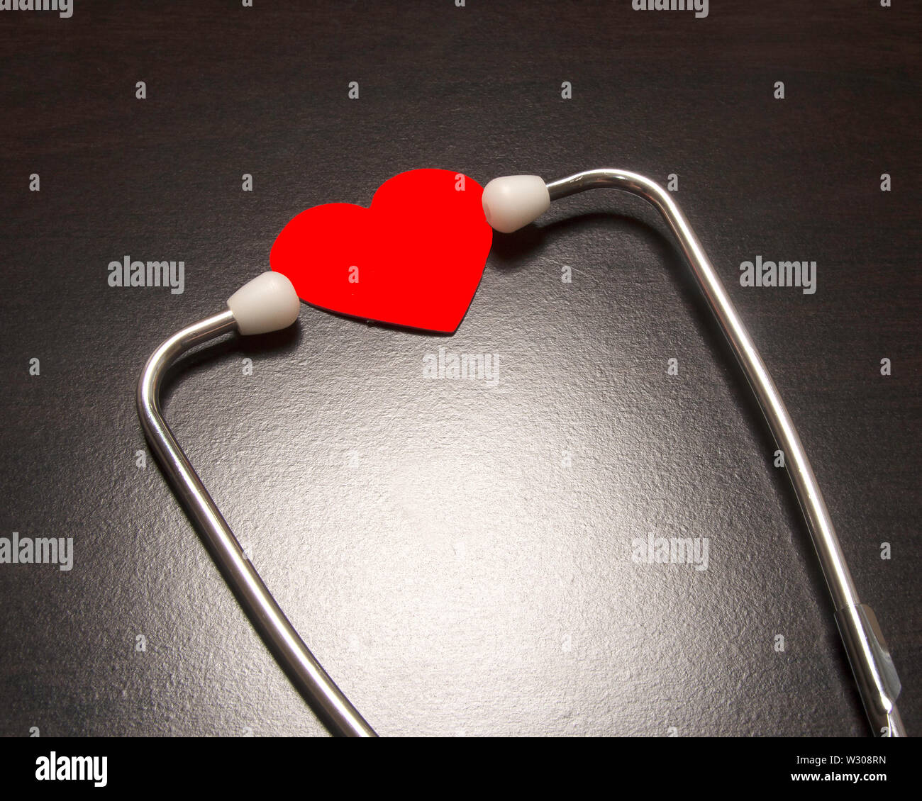 Stethescope hearing heart sounds Stock Photo - Alamy