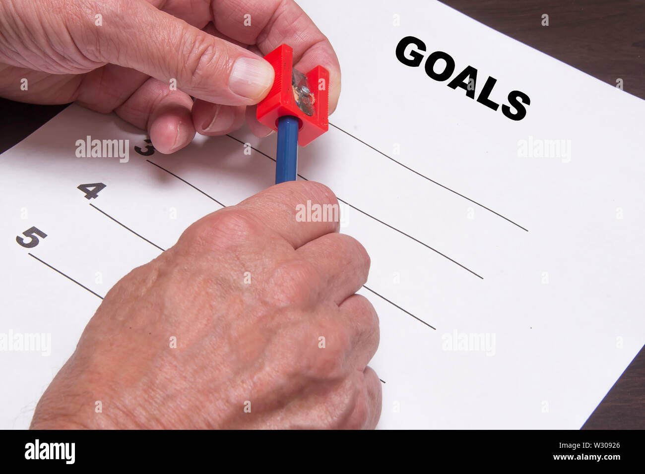 Goal sheet with a pencil and sharpener for preparing future activity ...
