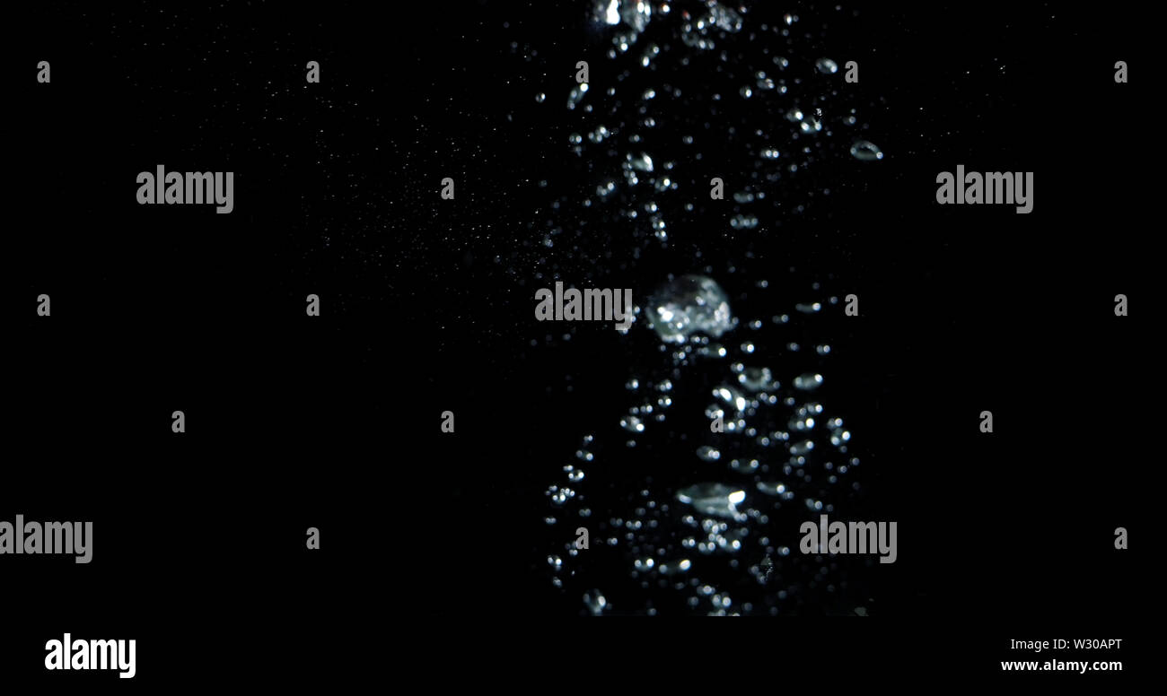 Blurry images of drinking water liquid bubbles or carbonate drink or oil shape or soda splashing ...
