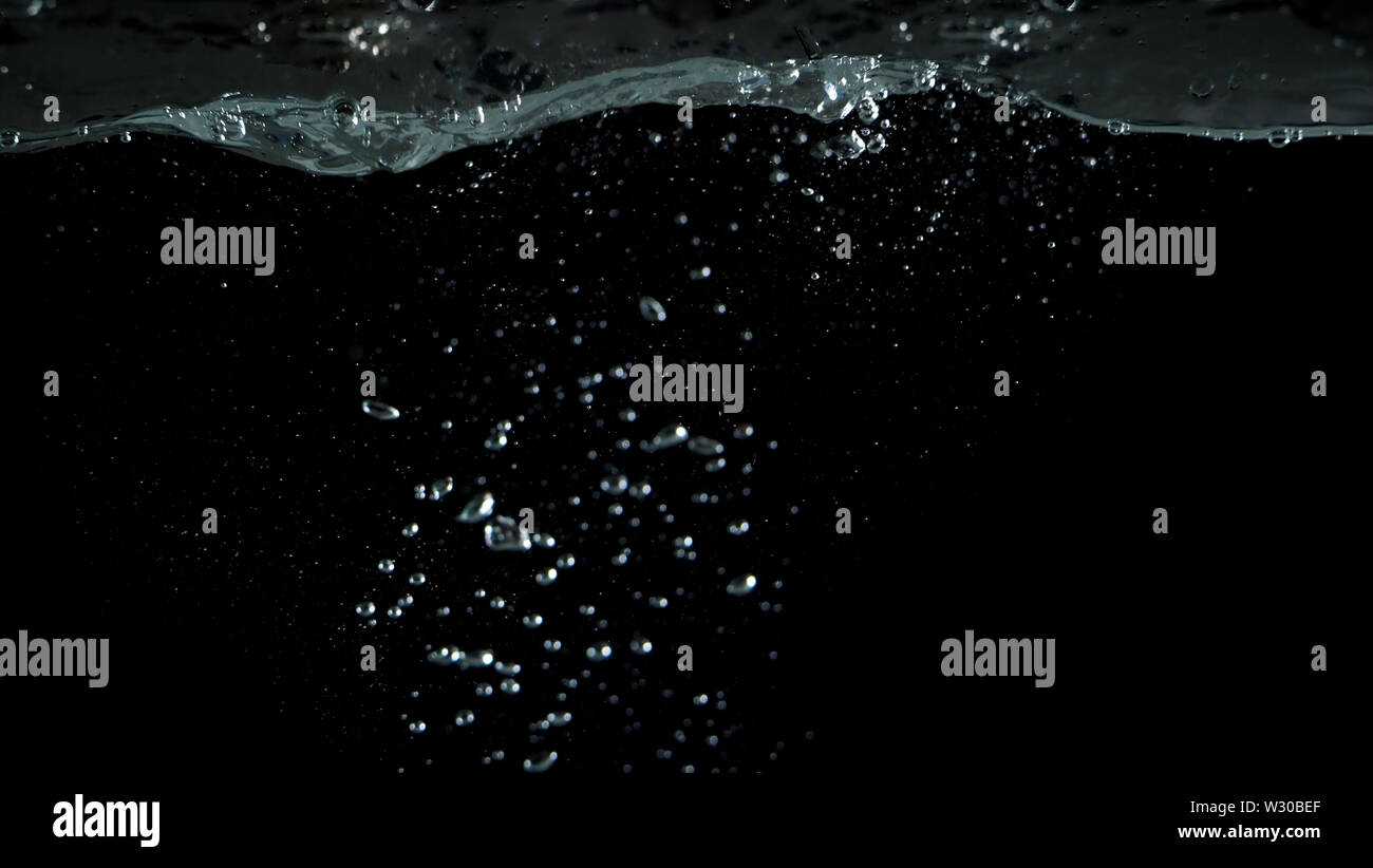 Blurry images of drinking water liquid bubbles or carbonate drink or oil shape or soda splashing ...