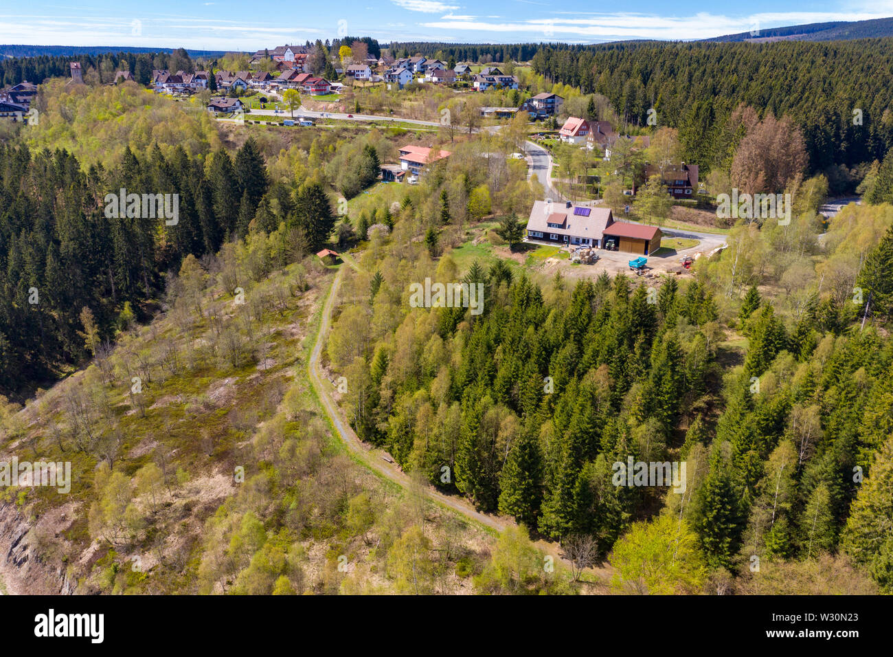 Aerial view of a village in the Harz mountains lying on a plateau ...