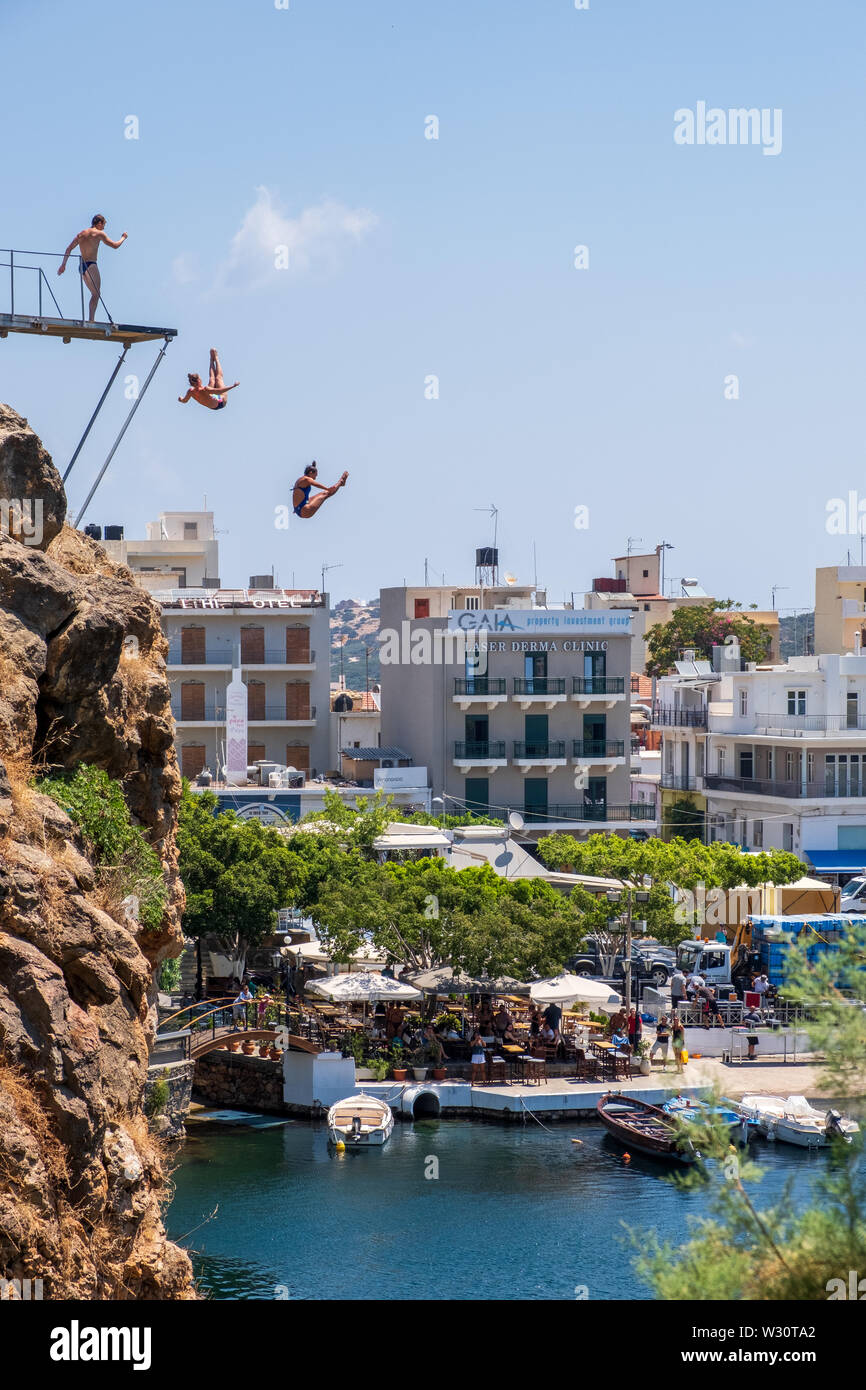Cliff diving in Agios Nikolaos, Crete Stock Photo - Alamy