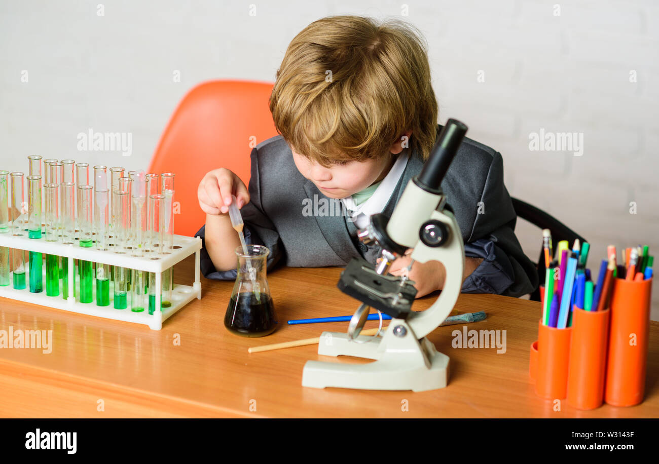 Kid study chemistry school lesson. School education. Toddler genius ...