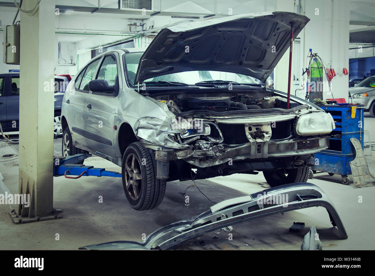 Vehicle in Auto Repair Shop Stock Photo - Alamy