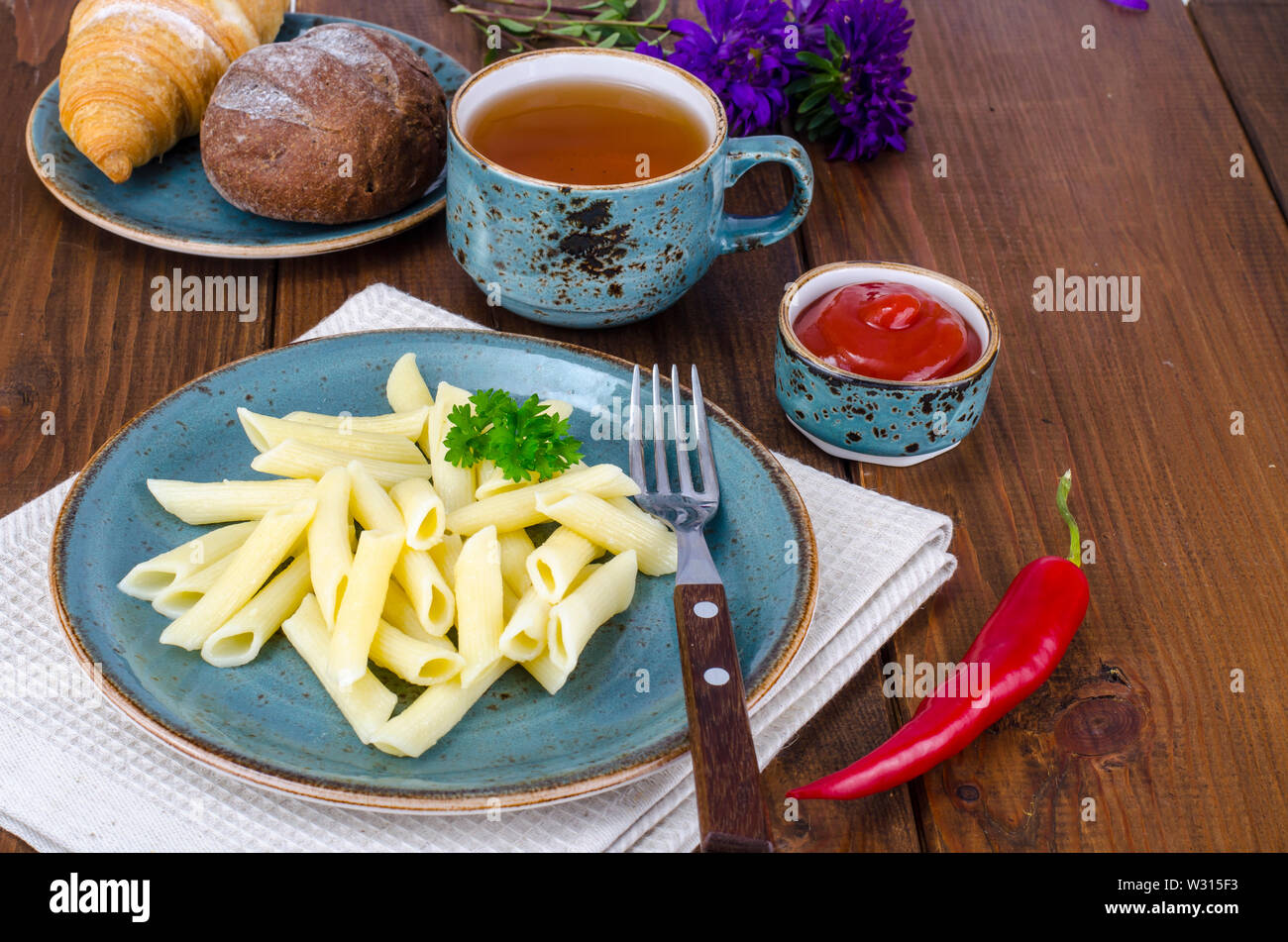 Boiled penne with ketchup Stock Photo - Alamy